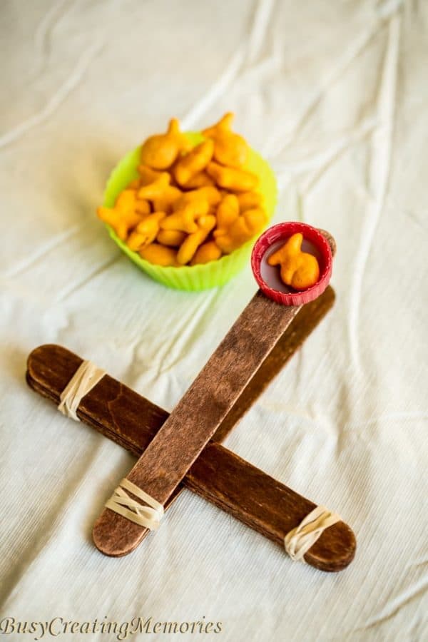 Craft Stick Catapult Game for fun Game Day party game for kids & adults