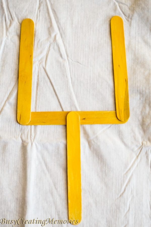 Craft Stick Catapult Game for fun Game Day party game for kids & adults